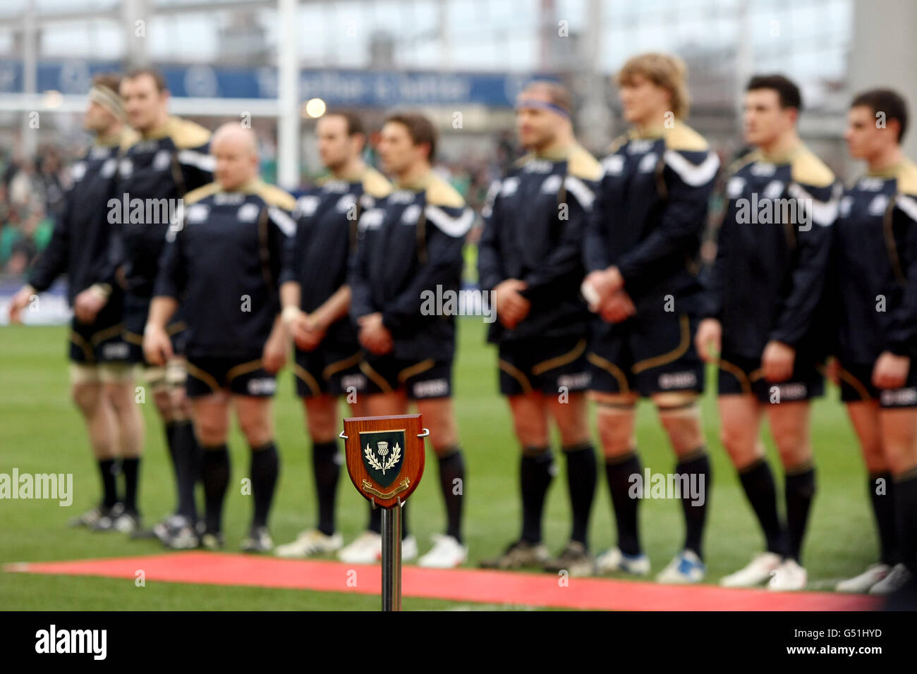 The Scotland team line up behind a Scottish Rugby Union shield Stock ...