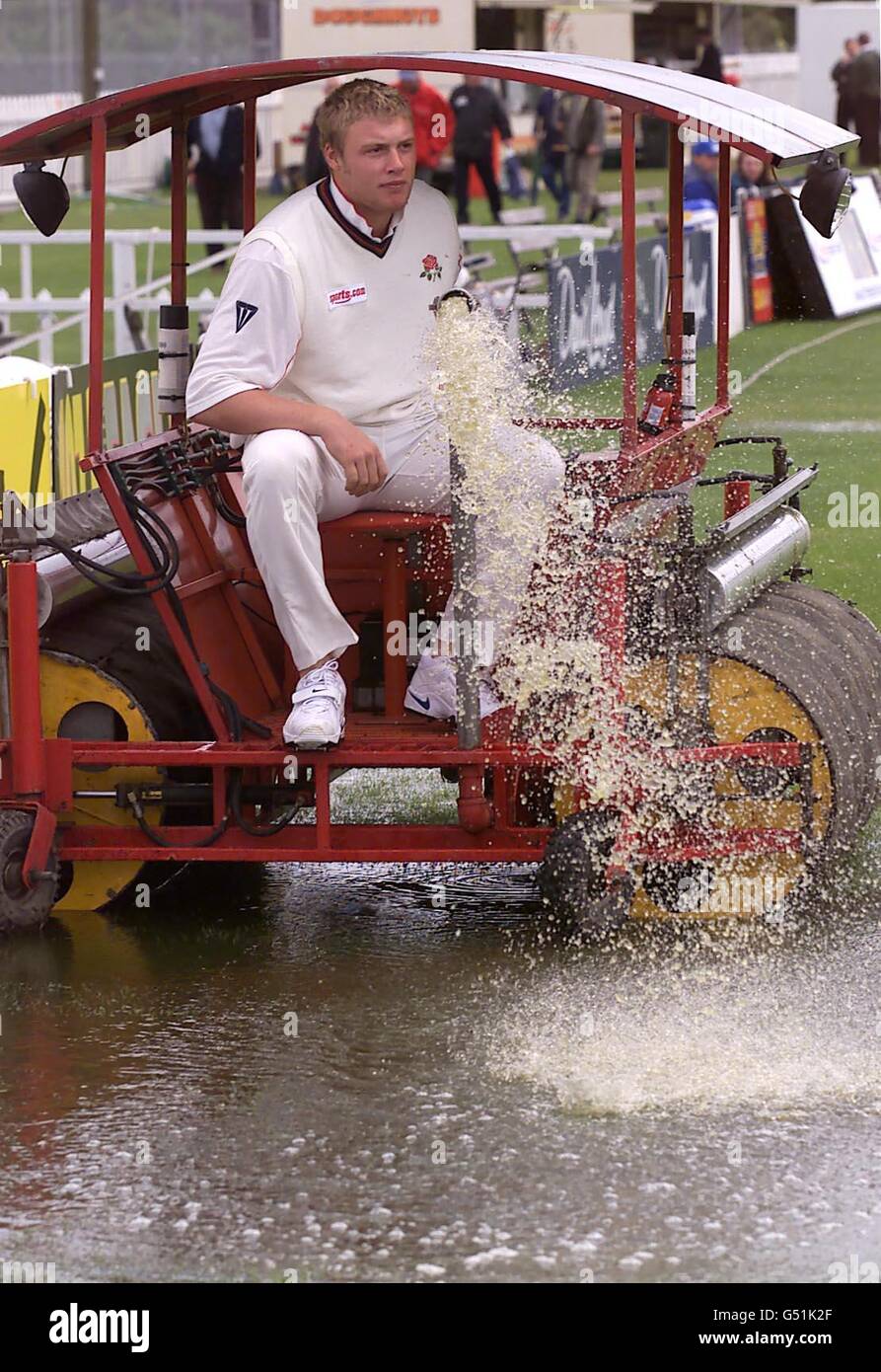 Lancashire's Andrew Flintoff supervises the mopping up operation at ...