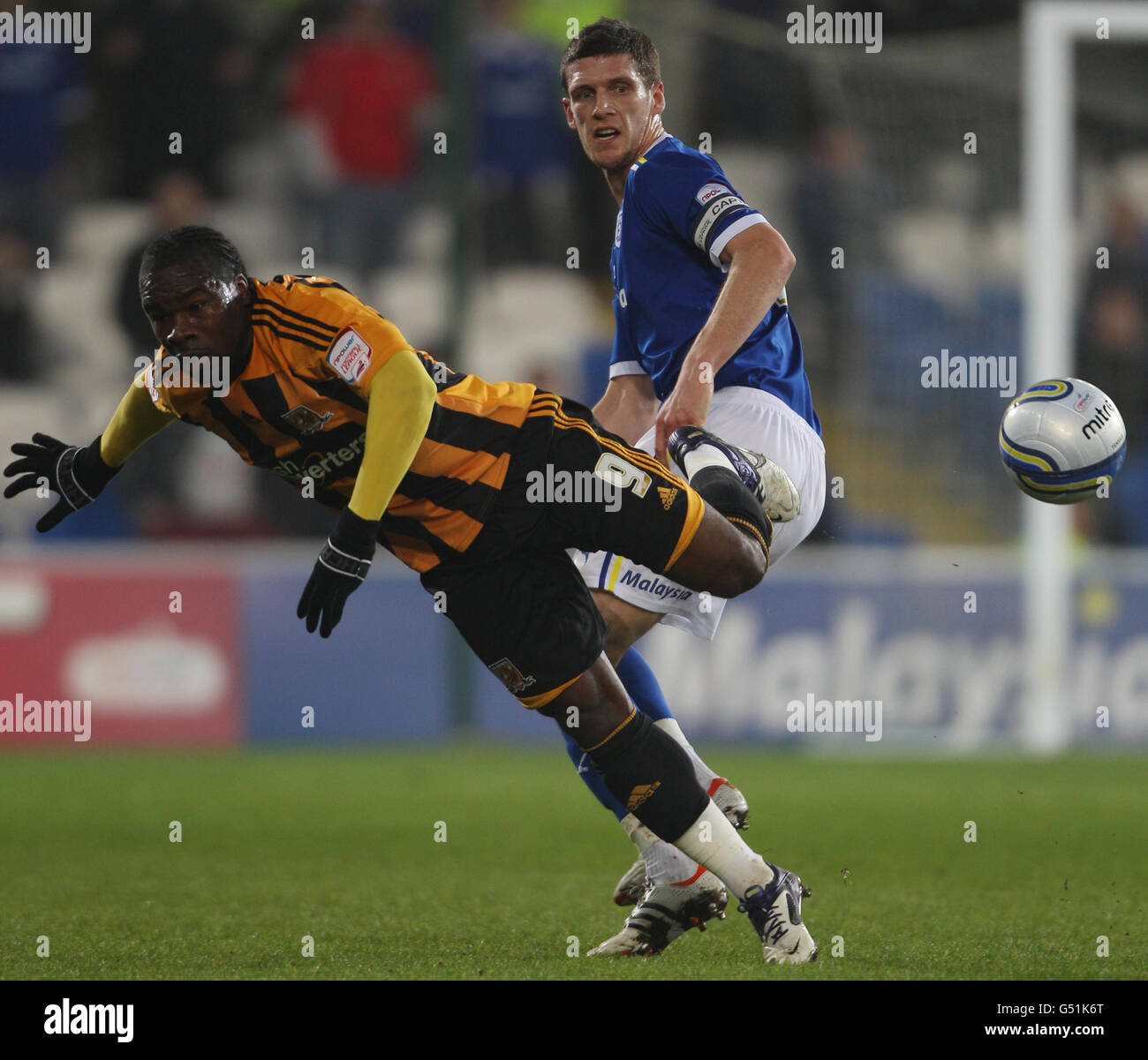 Hull City's Aaron McLean tussles with Cardiff City defender Mark Hudson ...