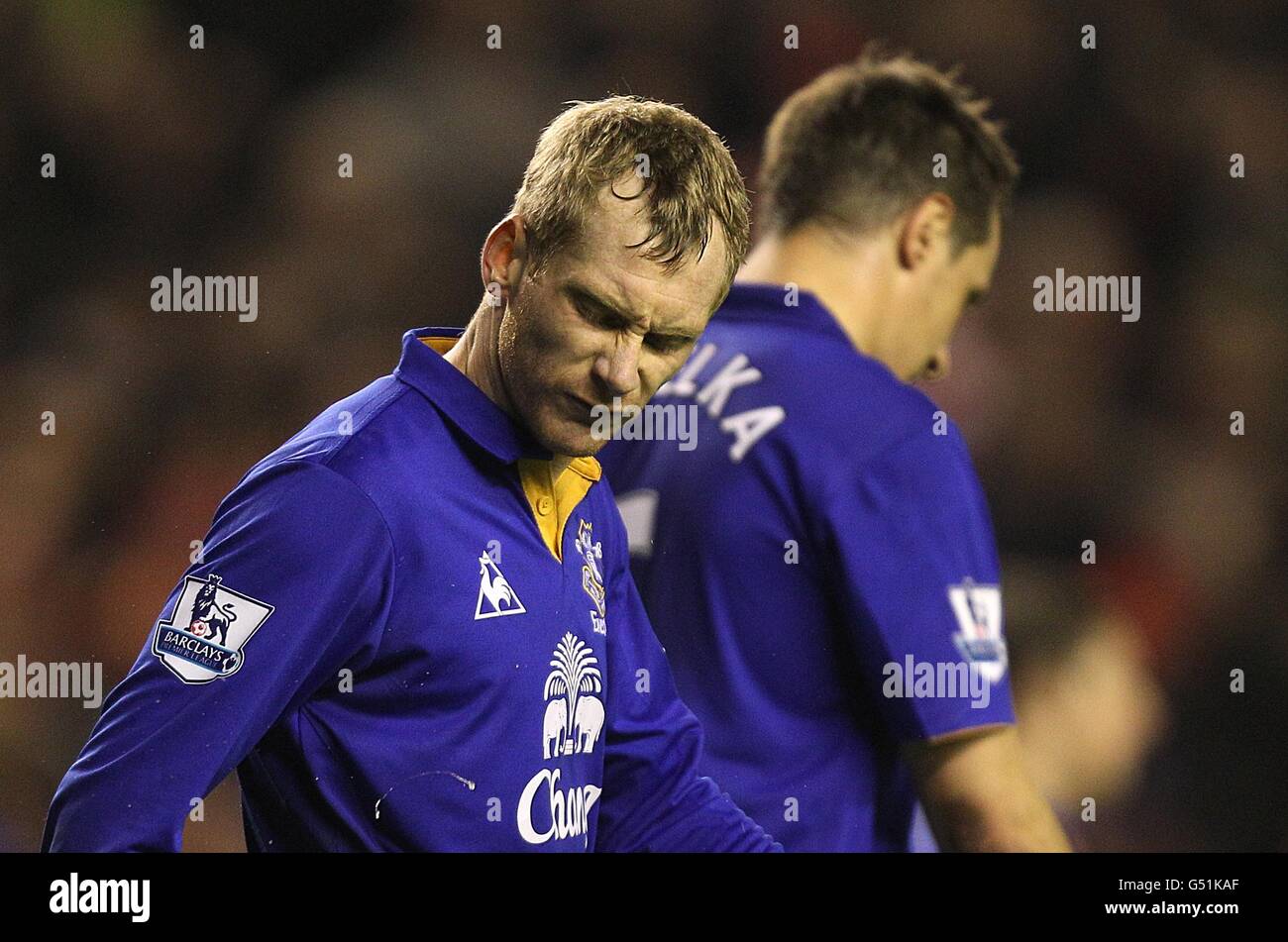 Everton's Phil Jagielka (right) and Tony Hibbert stand dejected after ...