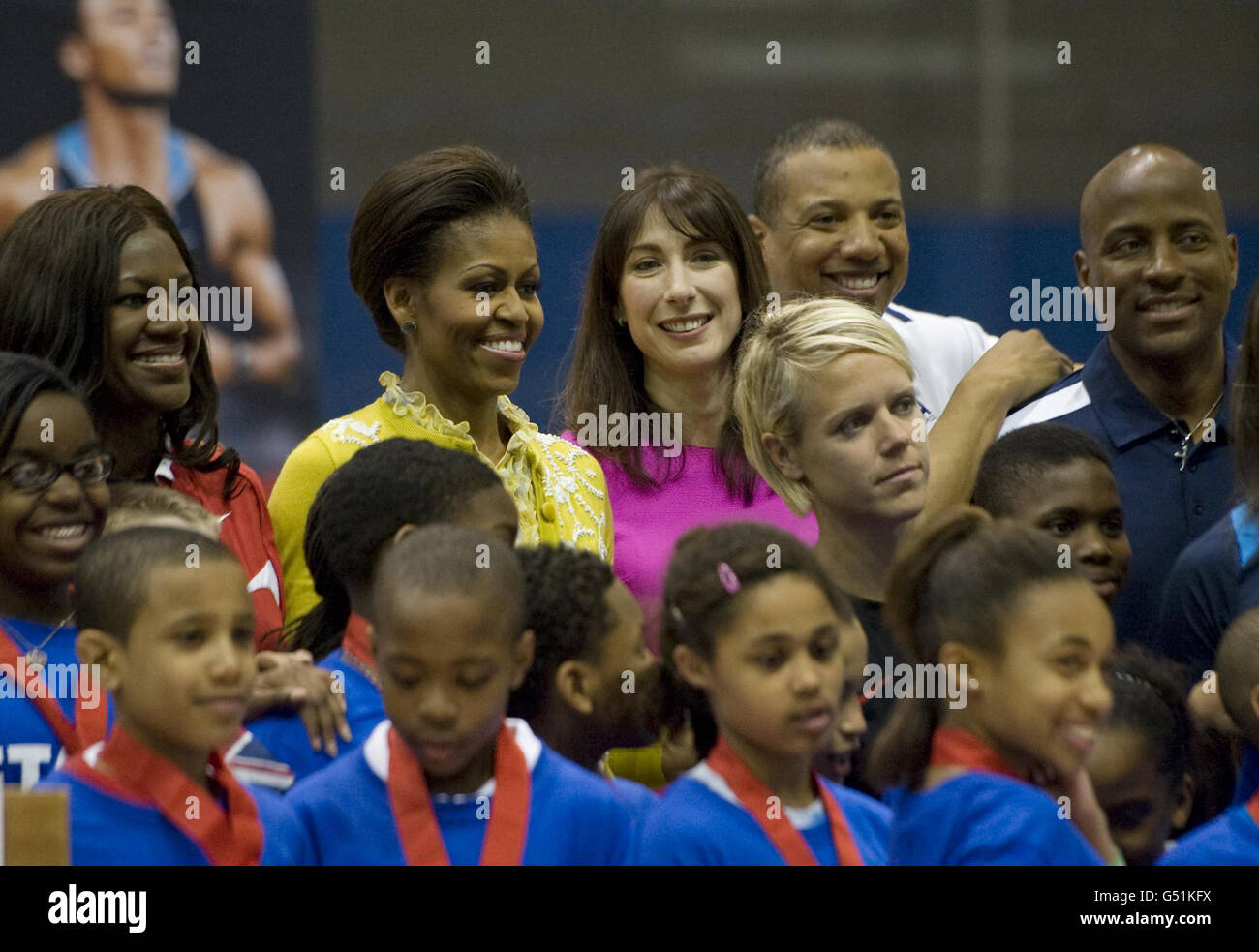 pose for photographs with Olympic athletes and elementary school ...
