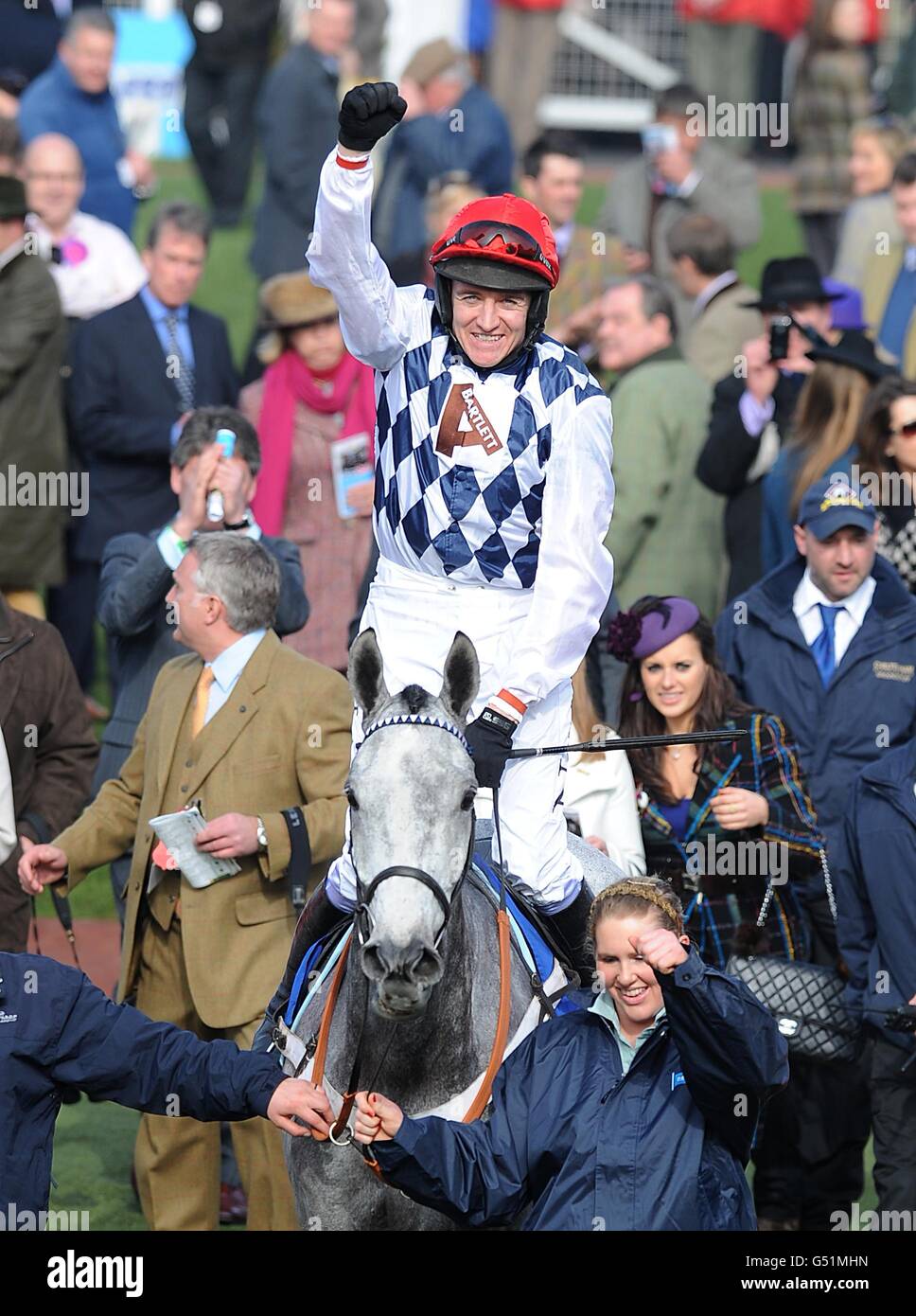 Jockey Barry Geraghty on Simonsig celebrates victory in the Neptune ...