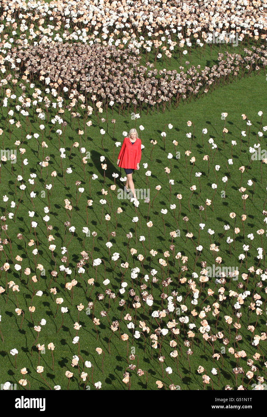Rachel Ingram walks through 'Out of Sync', an art installation of 10 ...