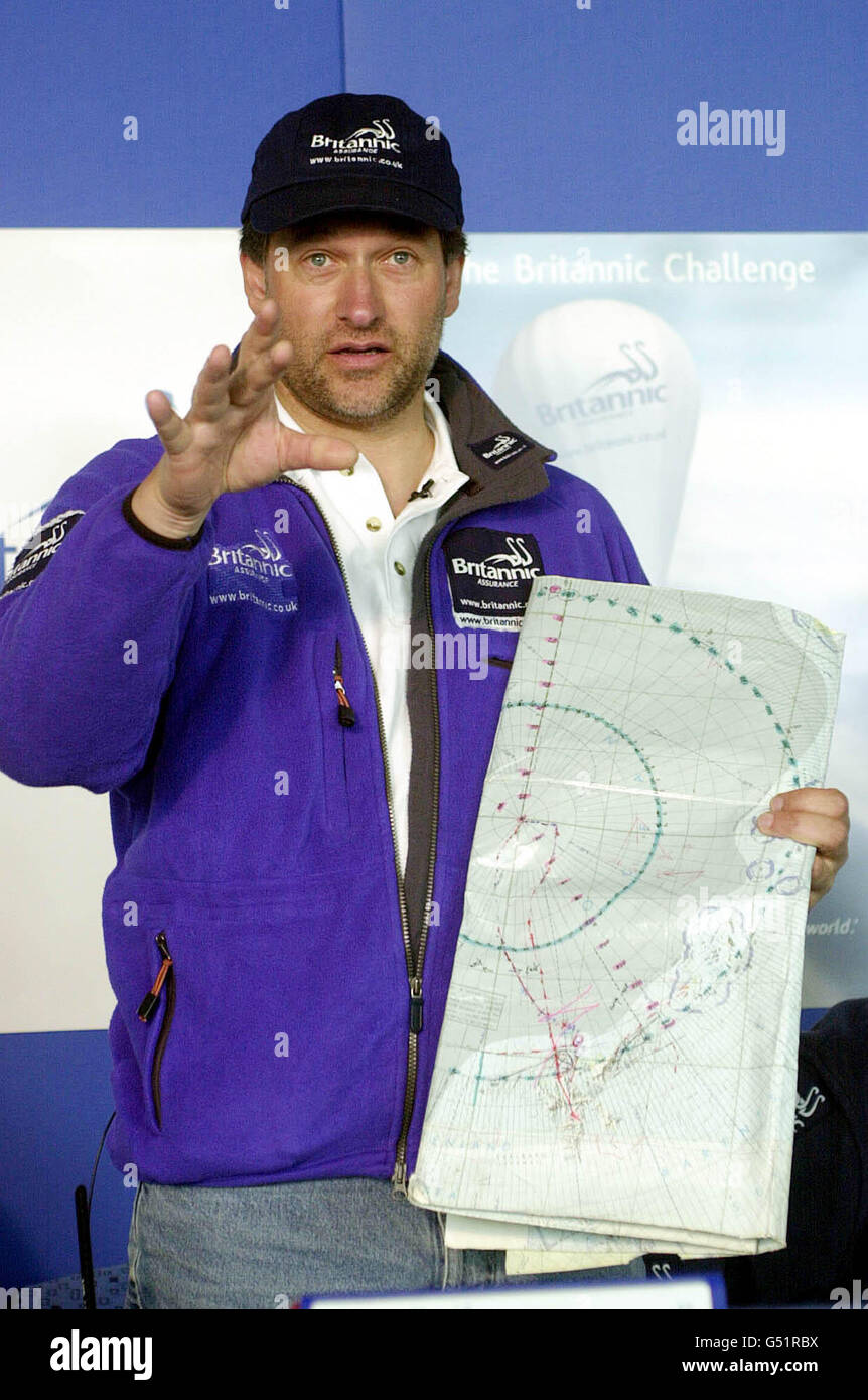 Old explorer holding map hi-res stock photography and images - Alamy