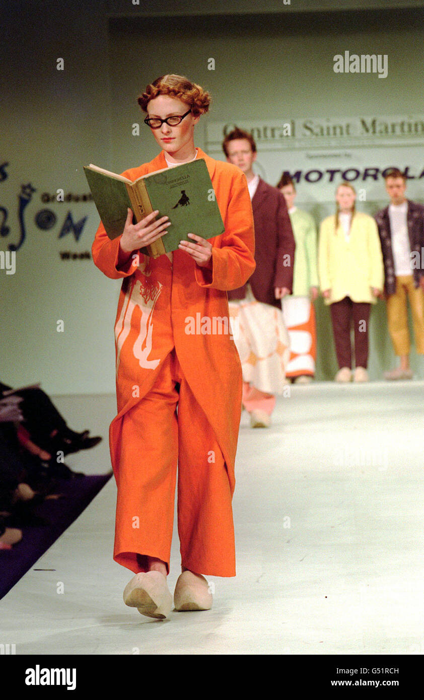 A model wearing an outfit from a graduate designer walks the catwalk ...