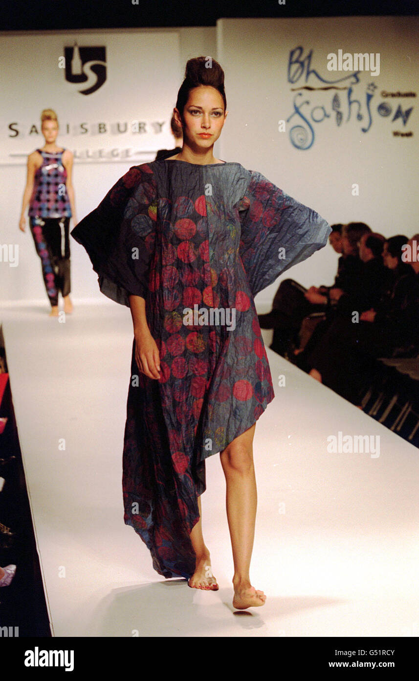 A model wearing an outfit from a graduate designer walks the catwalk ...