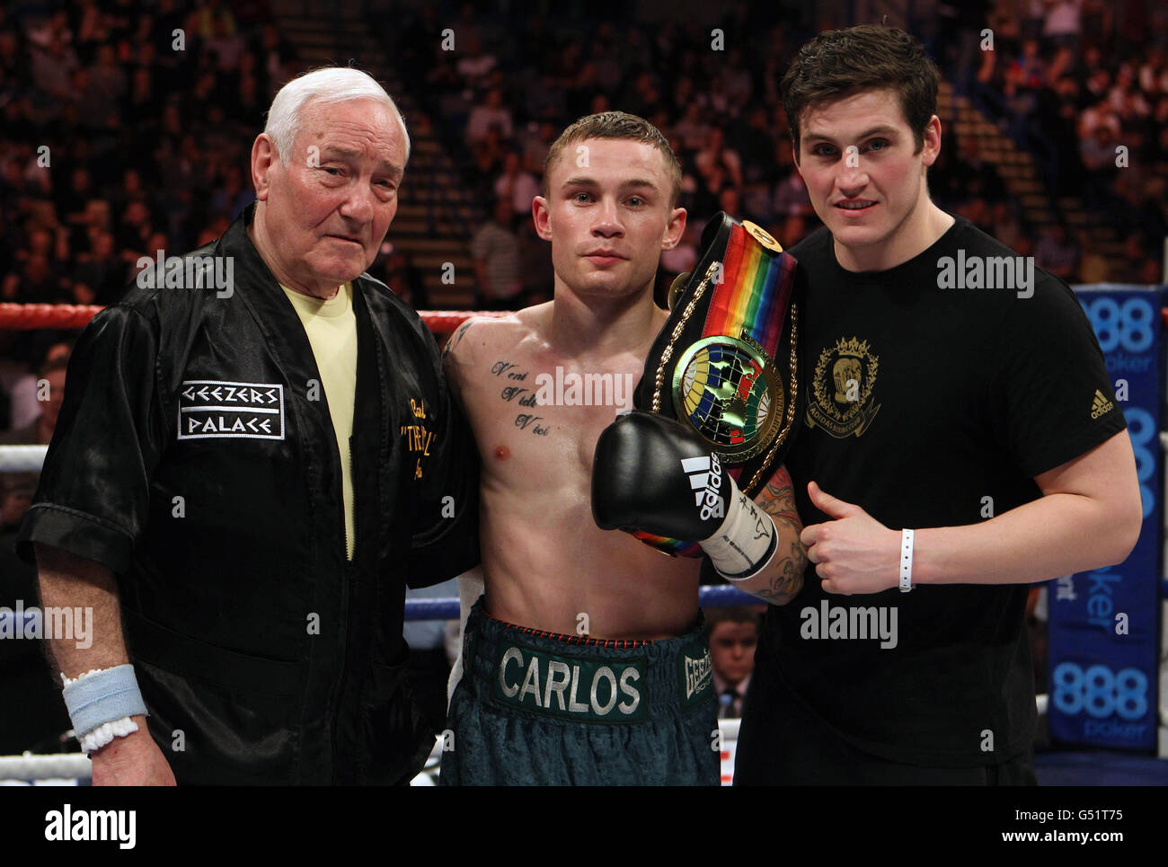 Carl Frampton (centre) celebrates beating Prosper Ankrah during their ...
