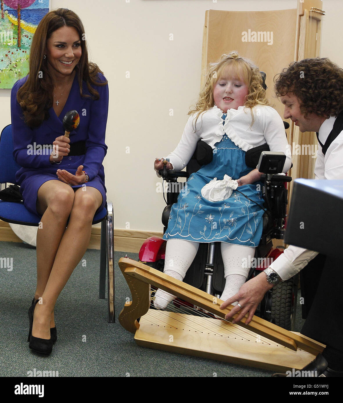Duchess of Cambridge joins in a music class beside Bethany Woods during ...