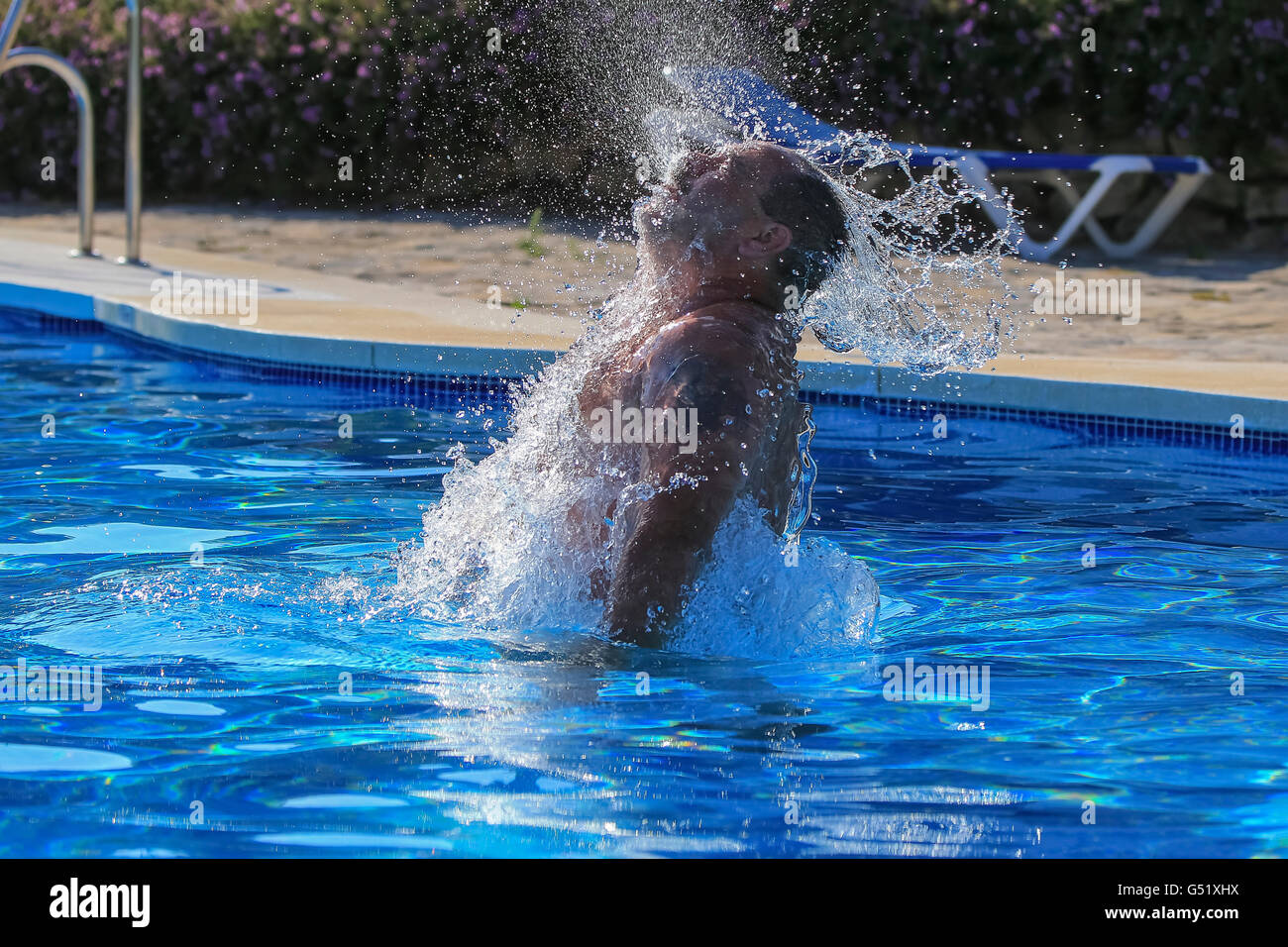 Man jump pool hi-res stock photography and images - Alamy