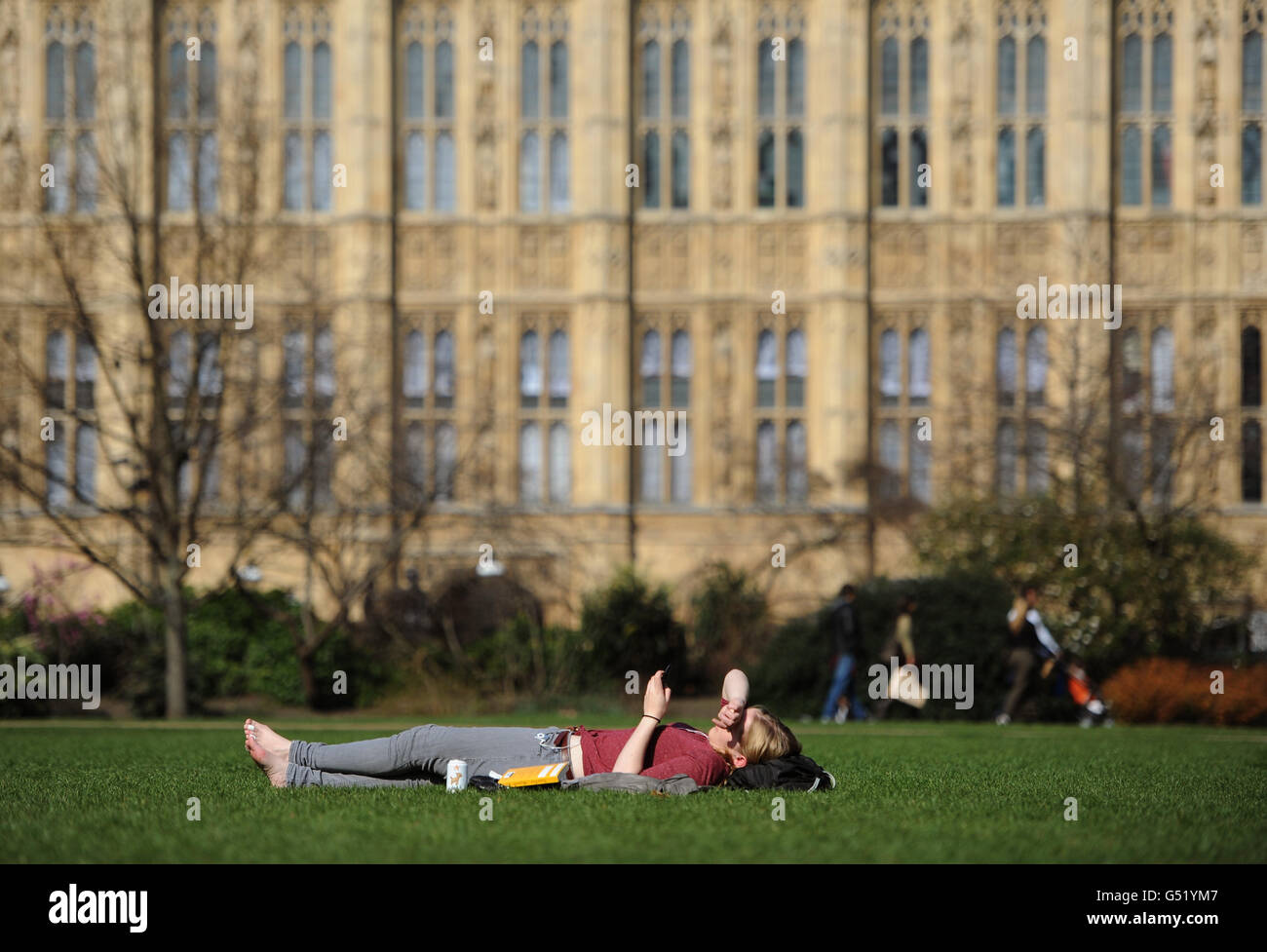 People enjoy the warm spring weather in victoria tower gardens hi-res ...