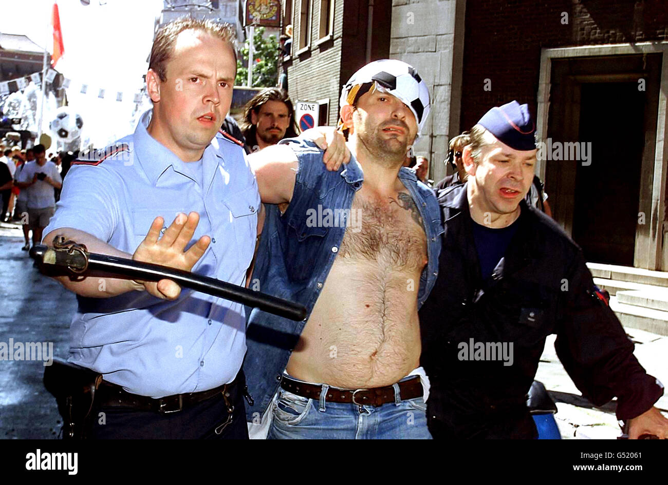 Hooligan restrained sport hi-res stock photography and images - Alamy