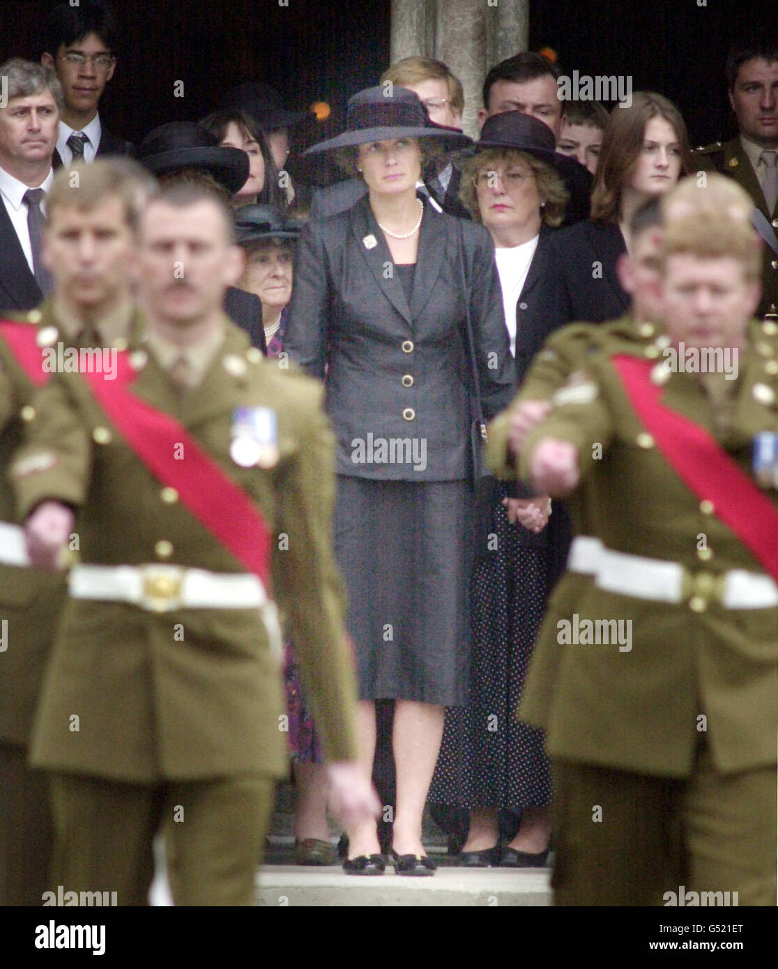 Heather Saunders (C) leaves Salisbury Cathedral after her husband ...