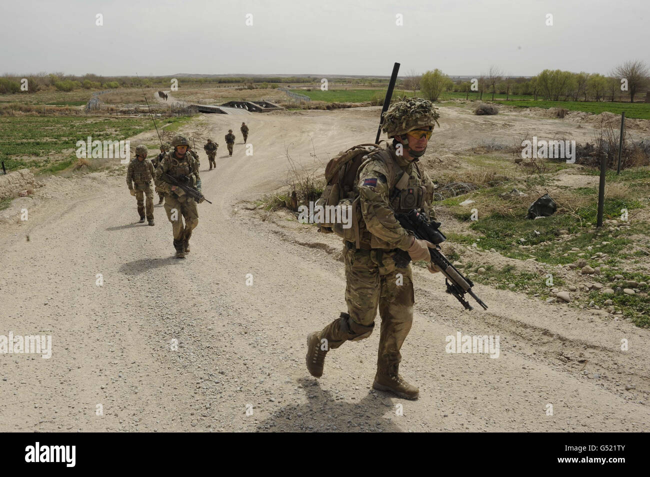 Soldiers while on patrol in the Deh Adam Khan district of Helmand ...