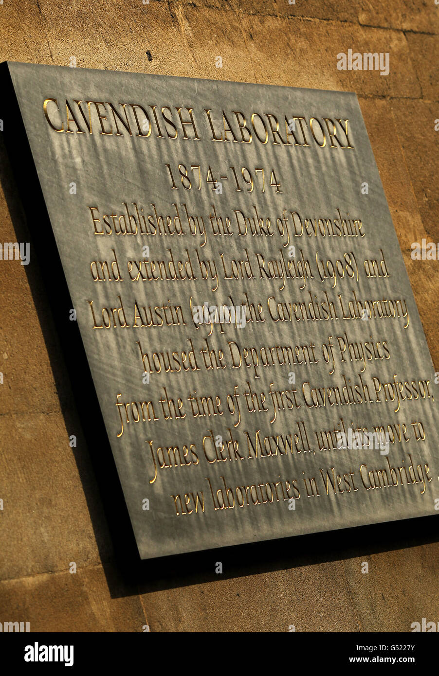 A plaque on the wall of the old Cavendish Laboratories in Free School ...