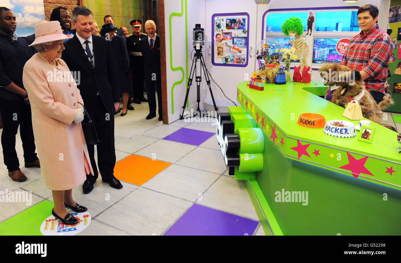 Queen Elizabeth II visits a CBeebies studio at MediaCity in Salford ...