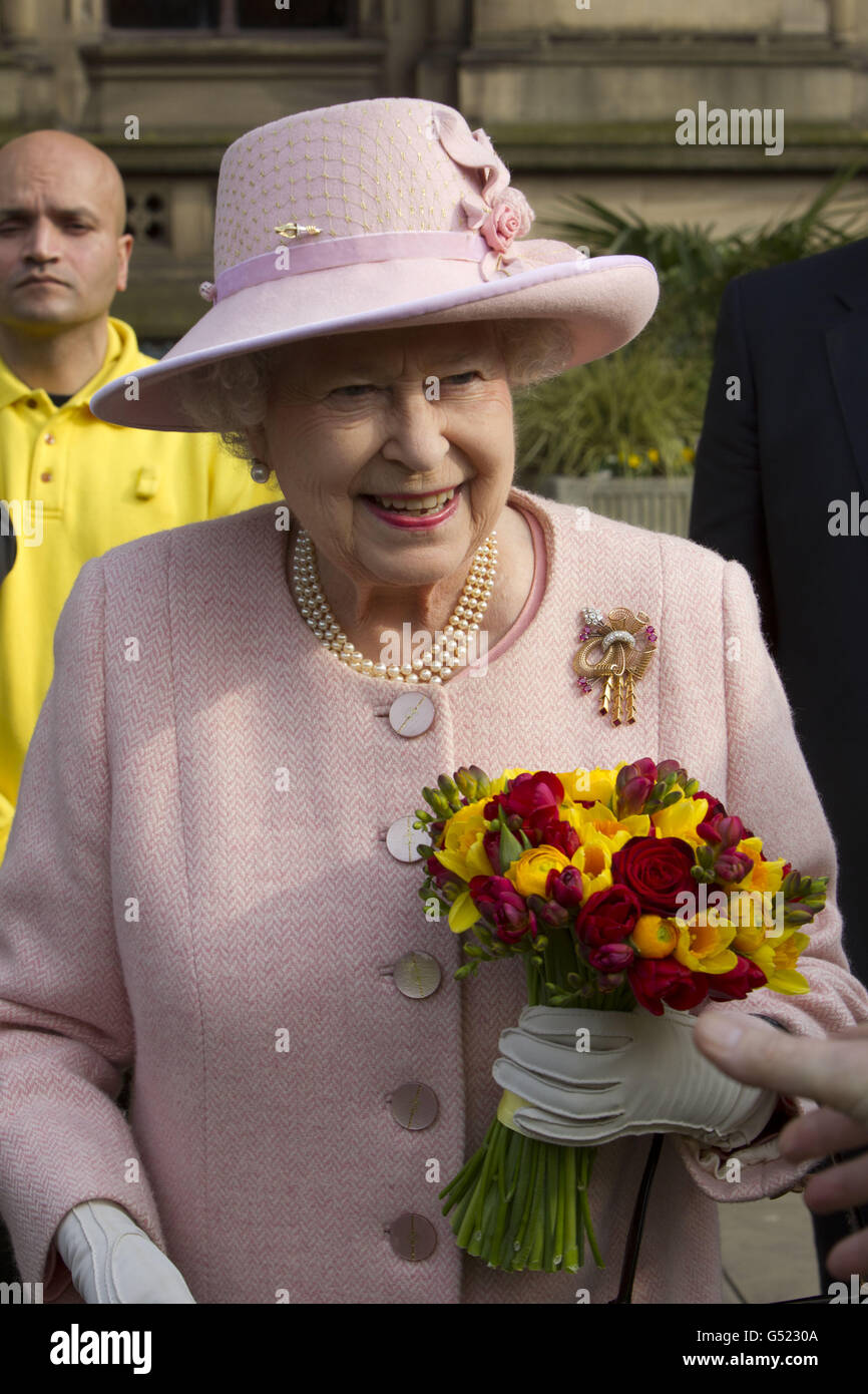Queen Elizabeth II meeting people outside Manchester Town hall during ...