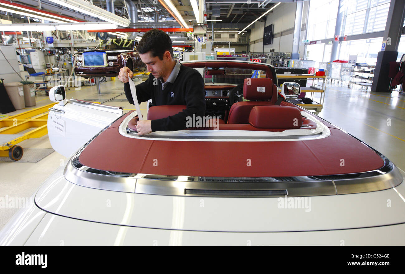 An engineer works on a Phanto Drophead Coupe at the Rolls Royce ...