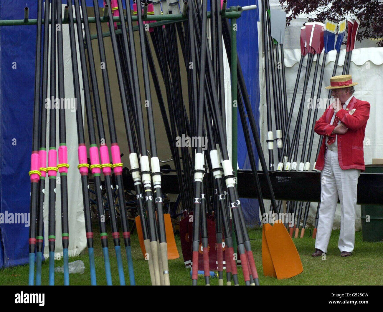 Henley Royal Regatta oars. A steward keeps an eye on the timing in the ...