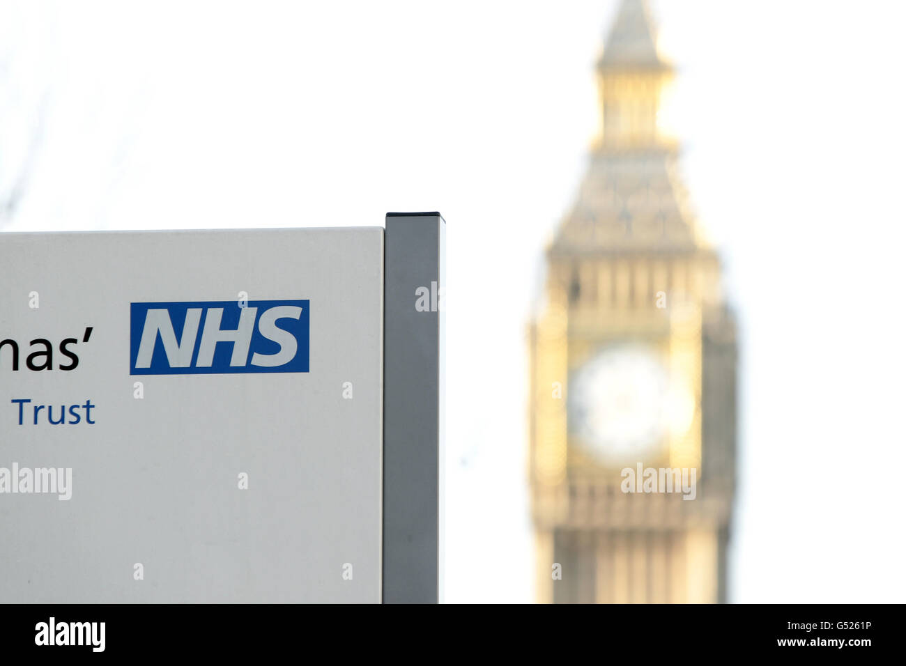 An NHS sign at St Thomas' Hospital, with Big Ben in the background, in ...