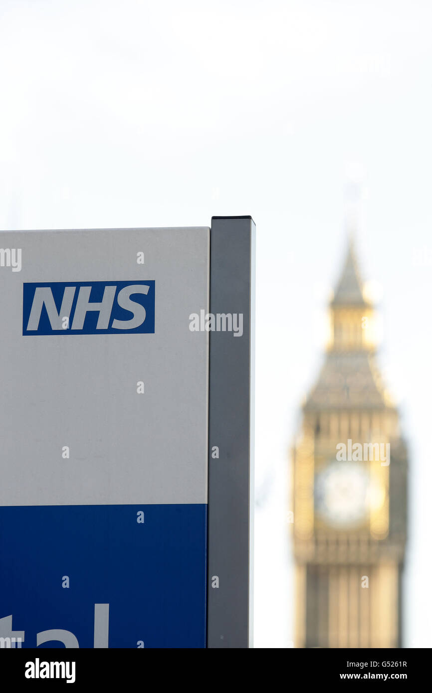 An NHS sign at St Thomas' Hospital, with Big Ben in the background, in ...