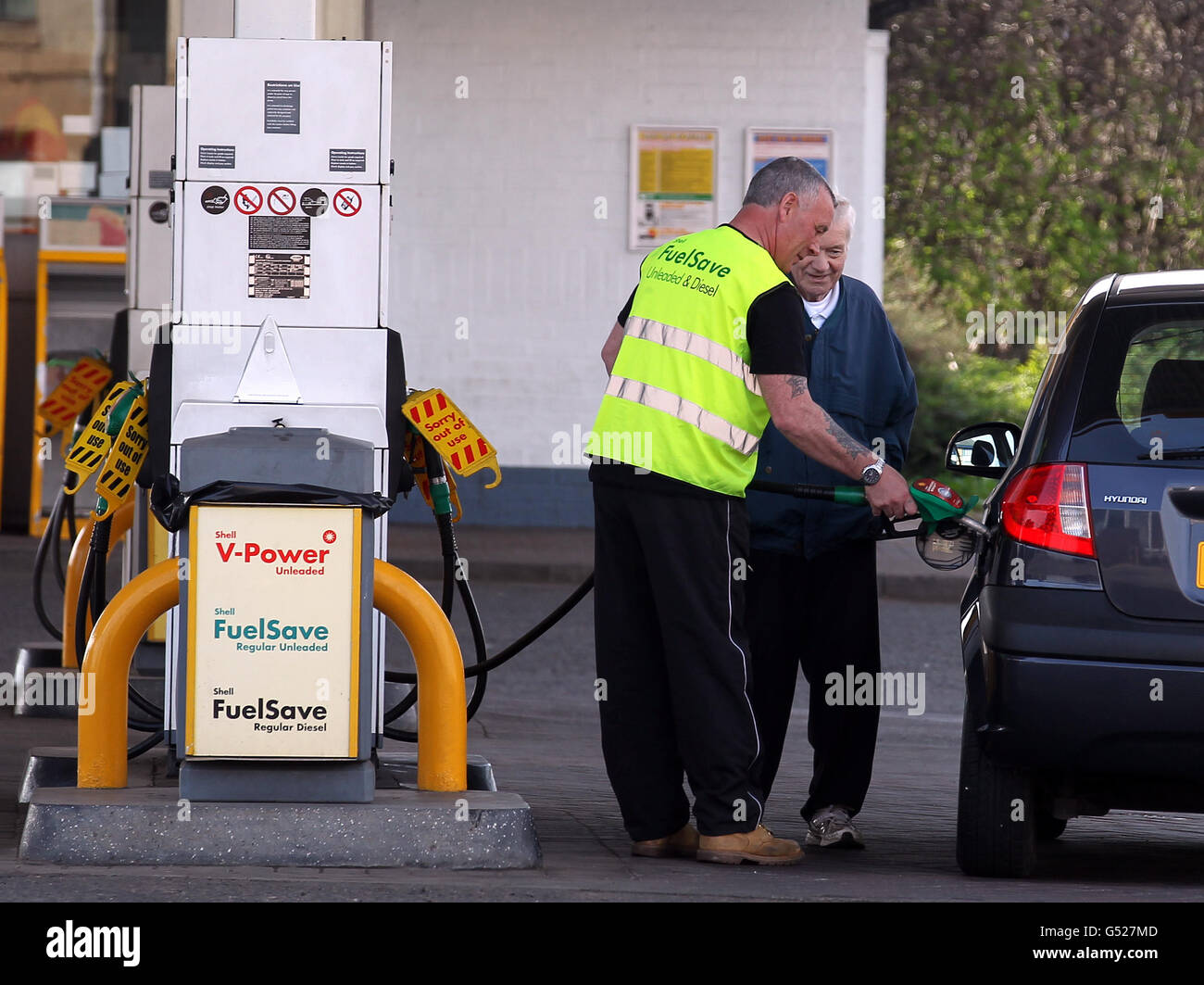 Filling station attendant hi-res stock photography and images - Alamy