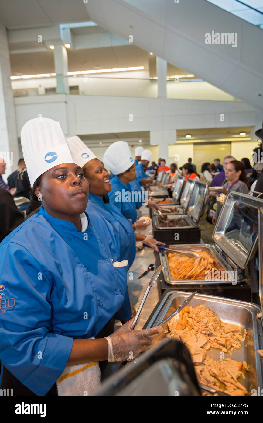 Detroit, Michigan - Workers serve dinner during a convention of the ...