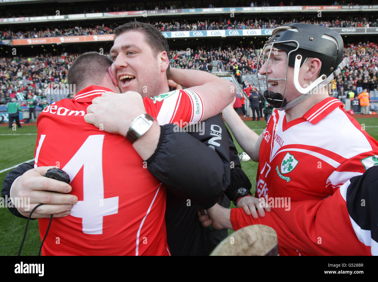 Loughgiel Shamrocks manager PJ McMullan hugs player Joseph Scullion ...