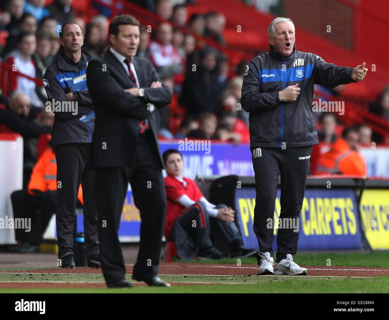 Tranmere Rovers Manager Ronnie Moore (right) barks his instructions ...