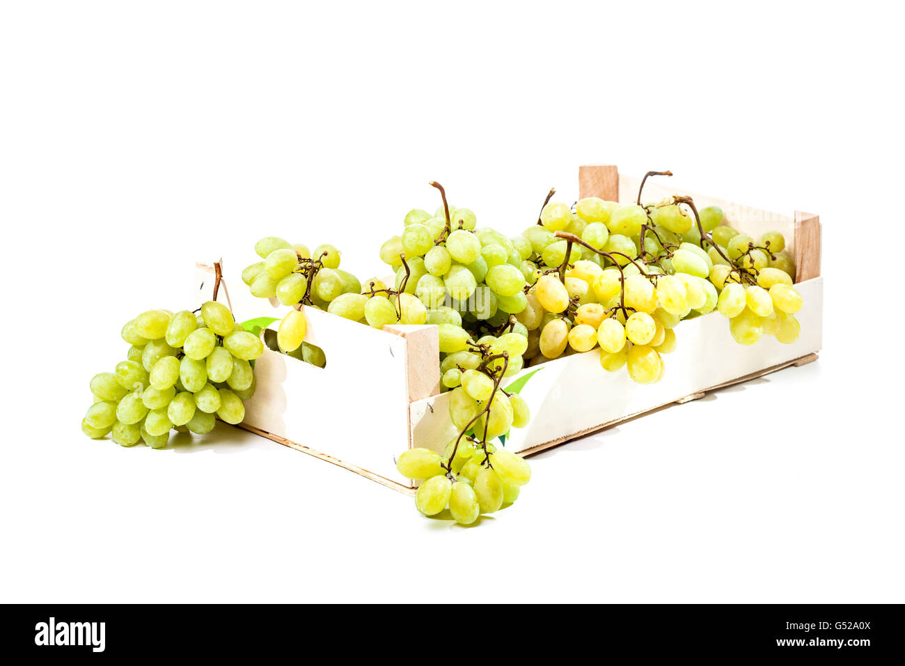 Ripe green grapes in a wooden crate box isolated Stock Photo - Alamy