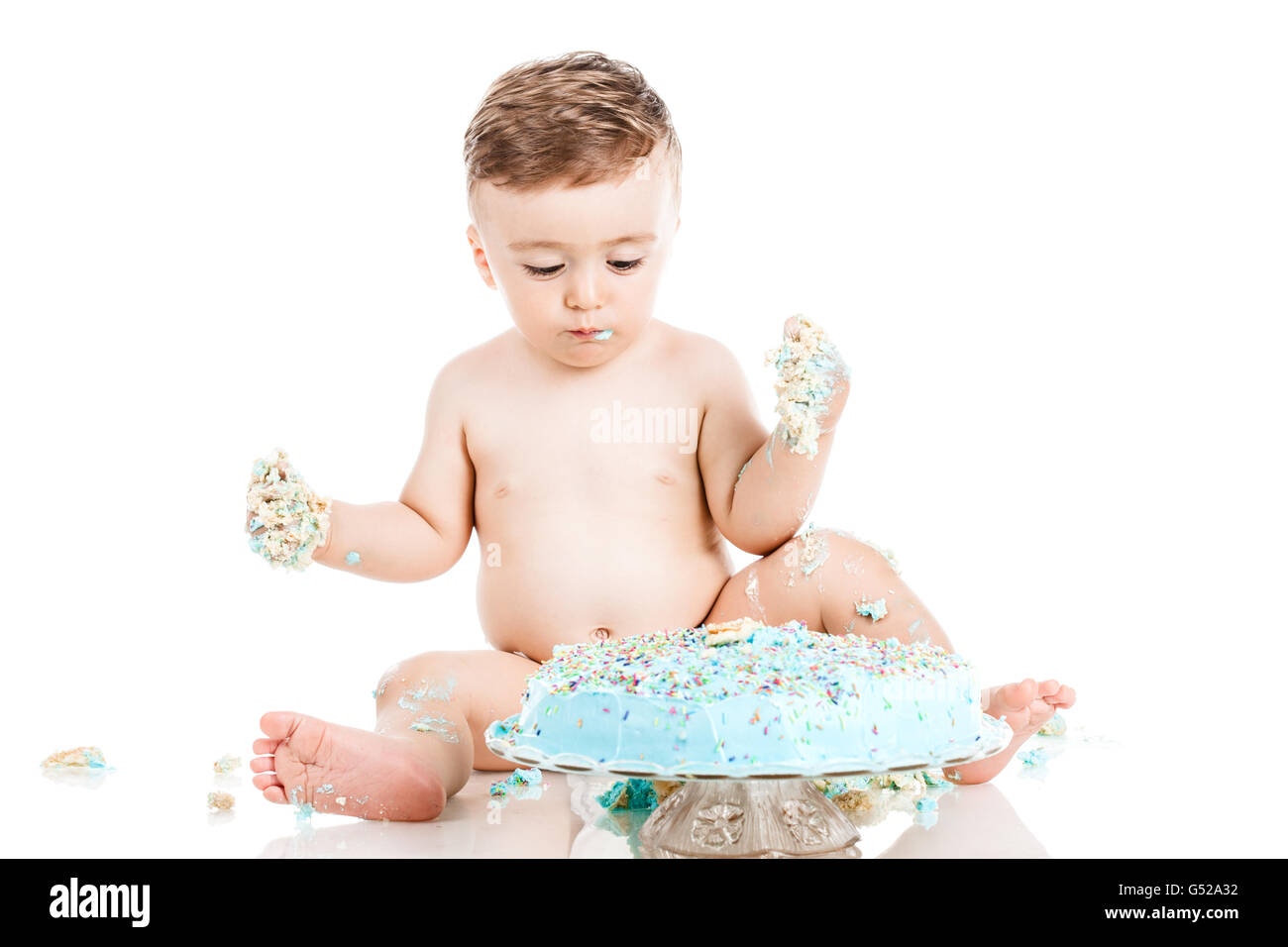 baby birthday boy with a smashed cake Stock Photo - Alamy