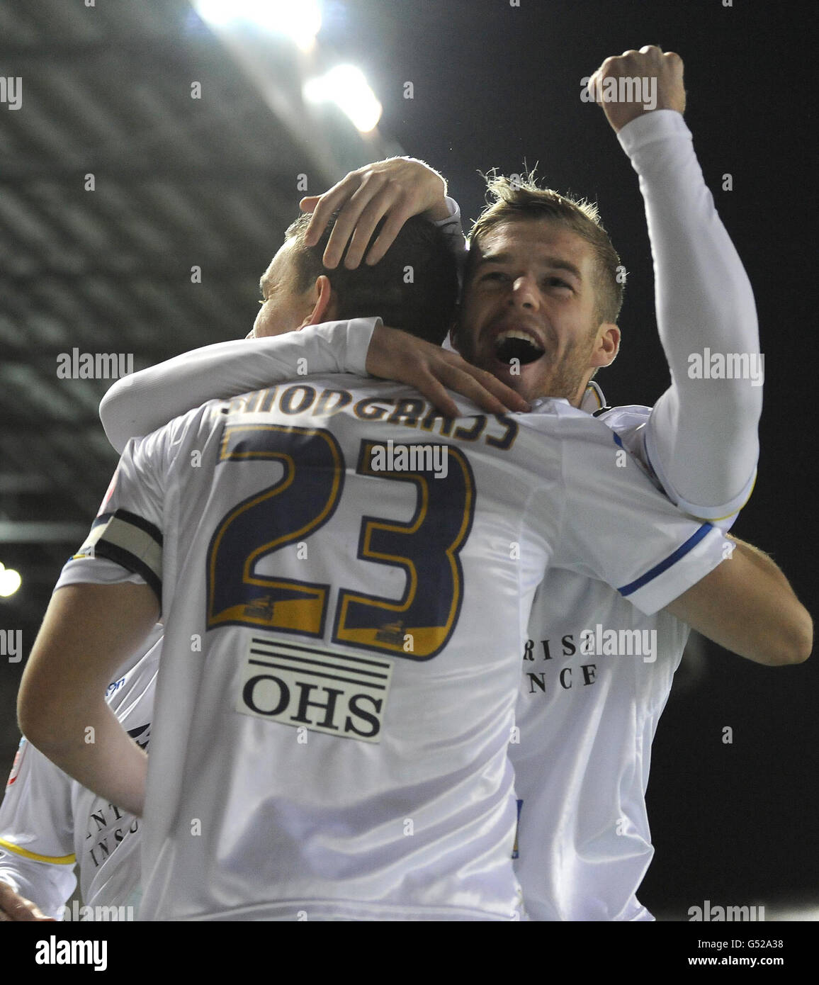 Leeds United's Robert Snodgrass (left) celebrates with Adam Clayton ...