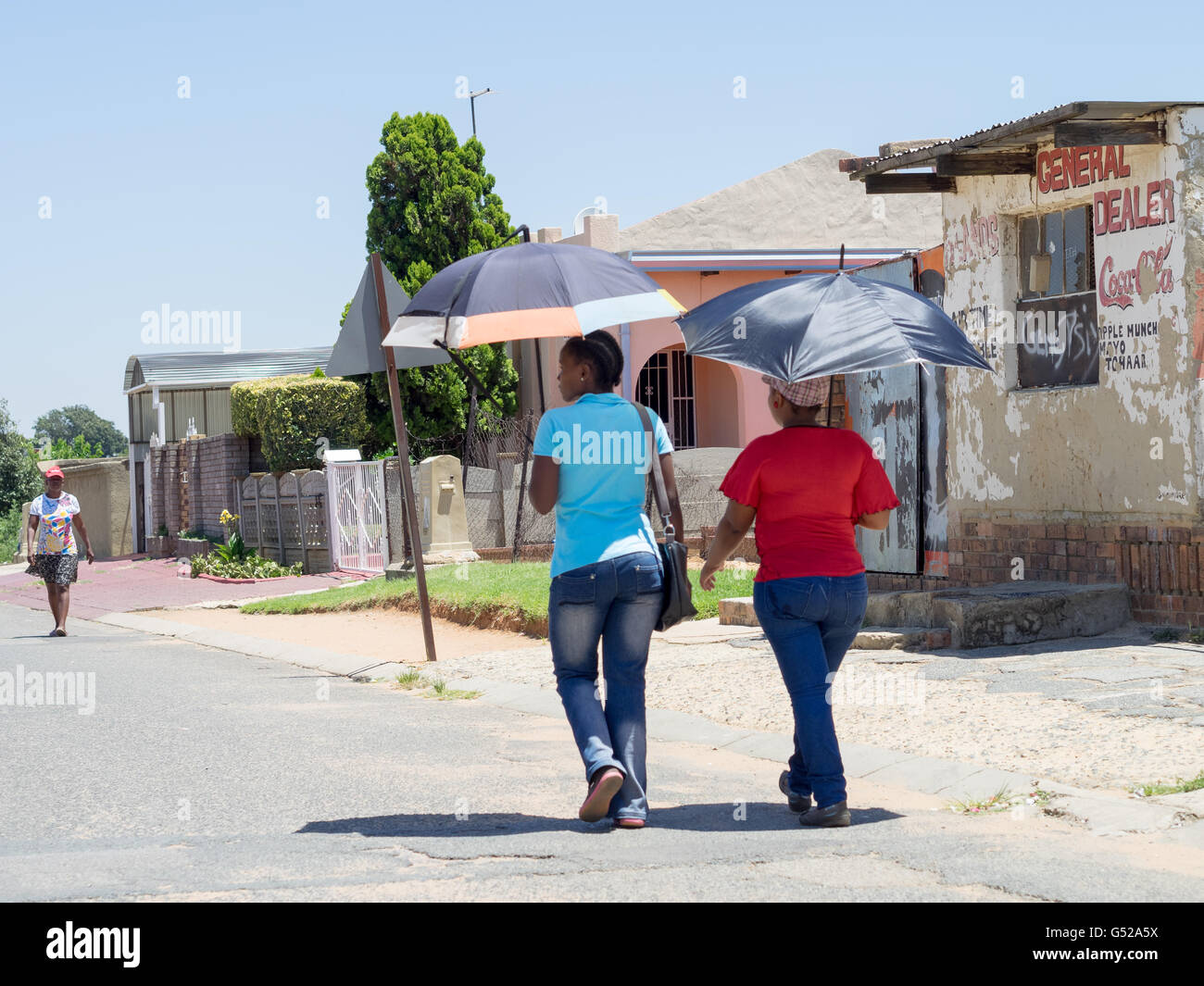 South Africa, Gauteng, Soweto, African women walking around the ...