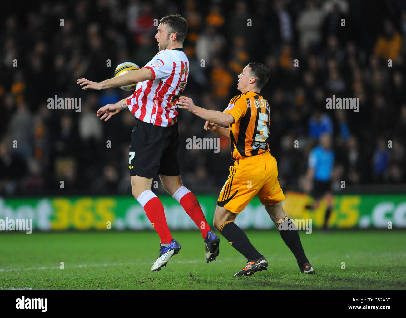 Hull City's James Chester (right) and Southampton's Rickie Lambert ...