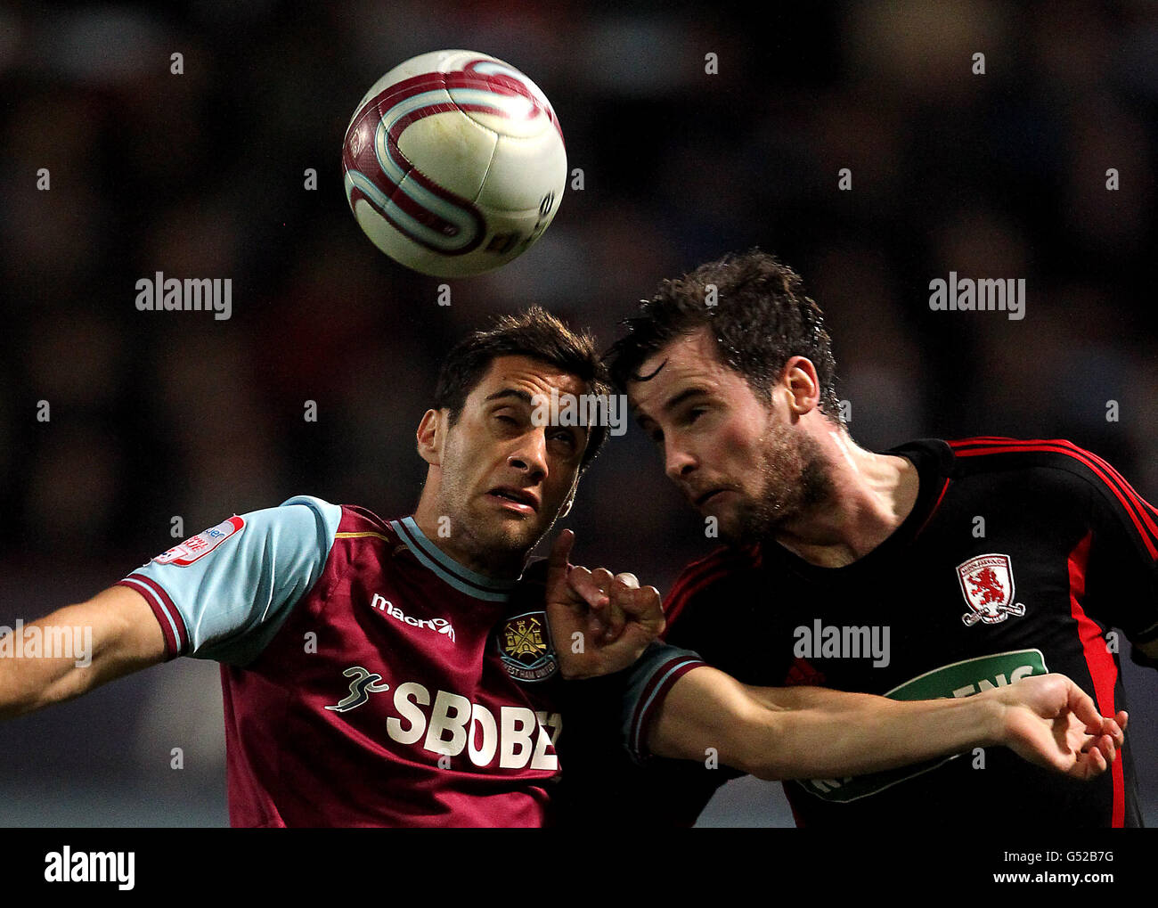 West Ham United's Sam Baldock and Middlesbrough's Matthew Bates battle ...