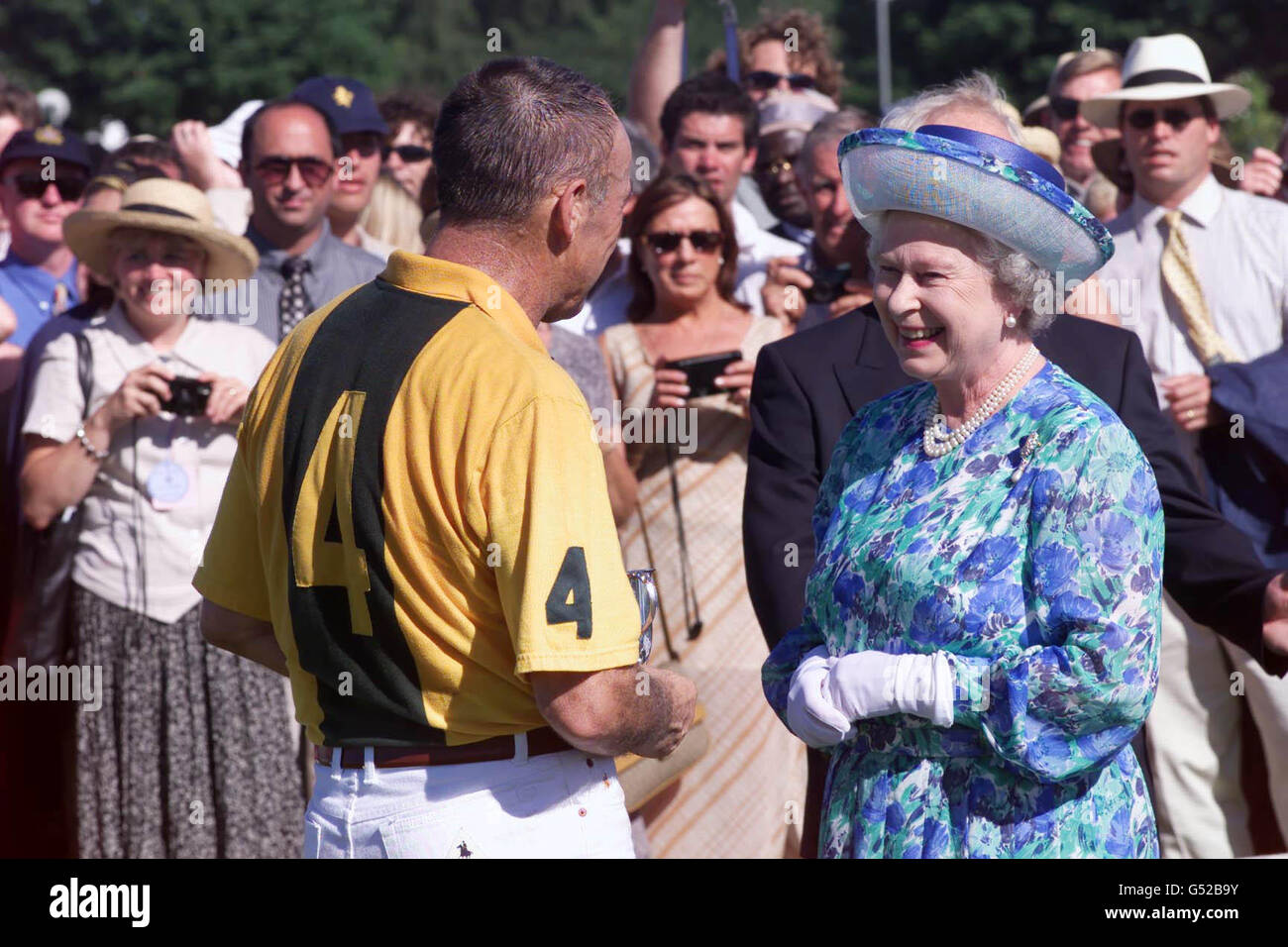 HM Queen Elizebeth congratulates Rick Stowe of Geebung polo team after ...