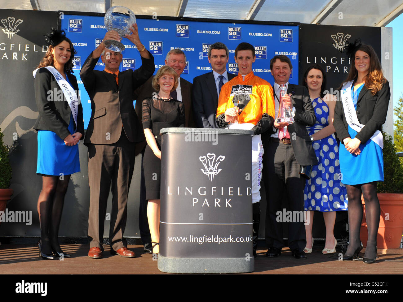 Connections of Premio Loco and jockey George Baker, with Sir Alex ...