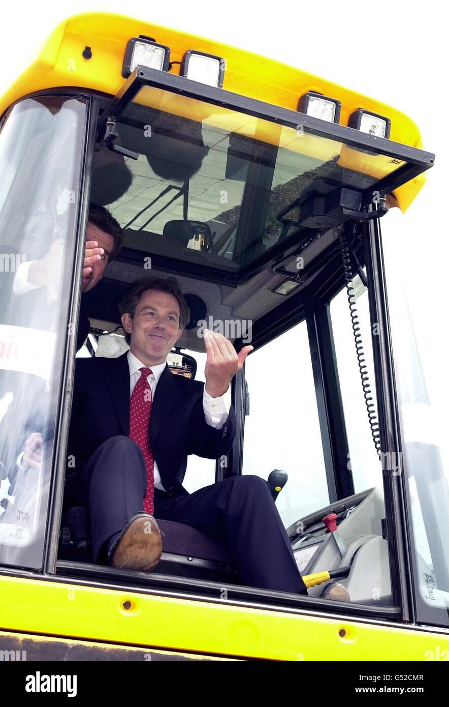 Sitting gesturing funny face cab tony blair hi-res stock photography ...