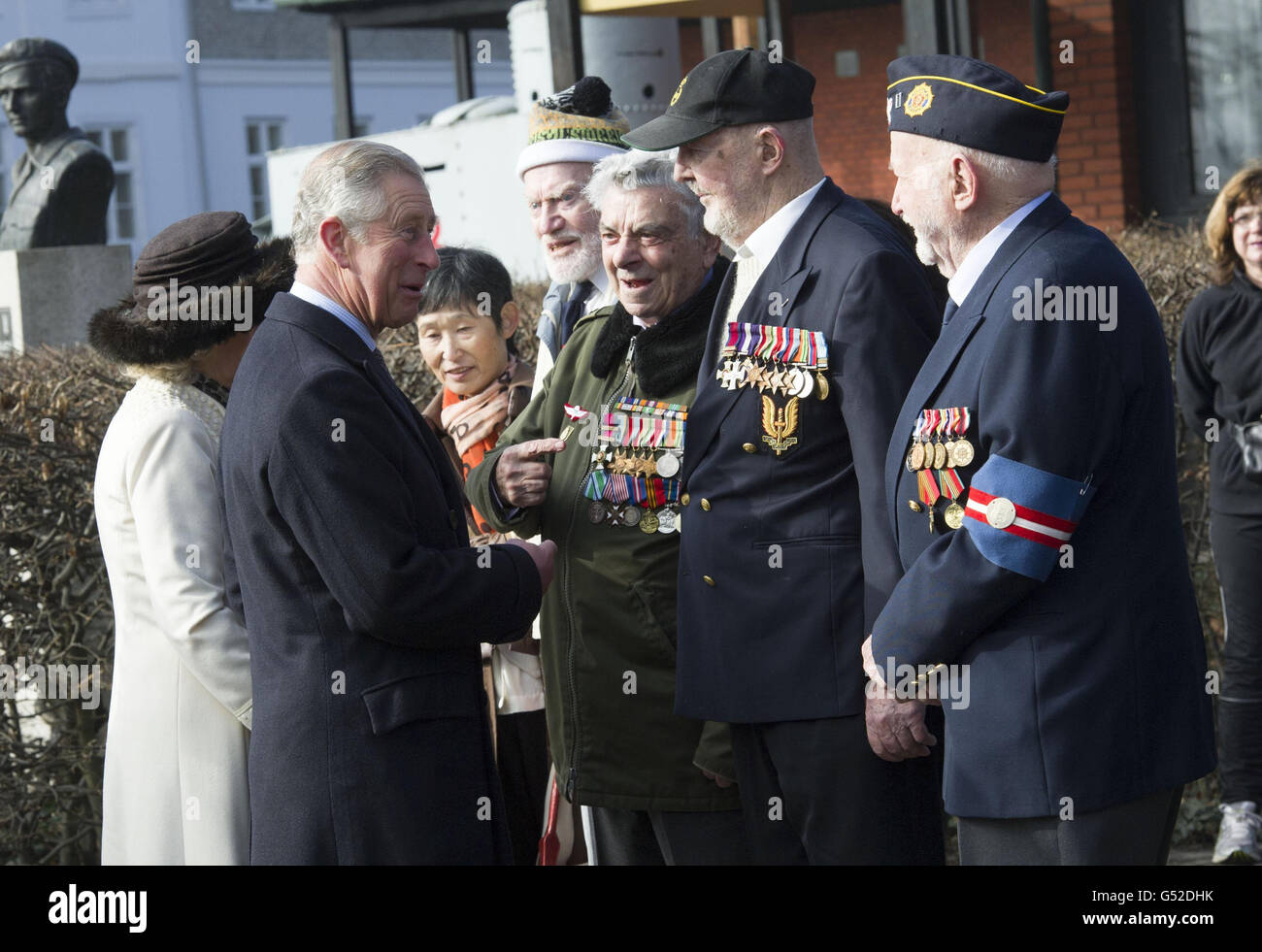 The Prince of Wales and the Duchess of Cornwall, meet Danish war ...