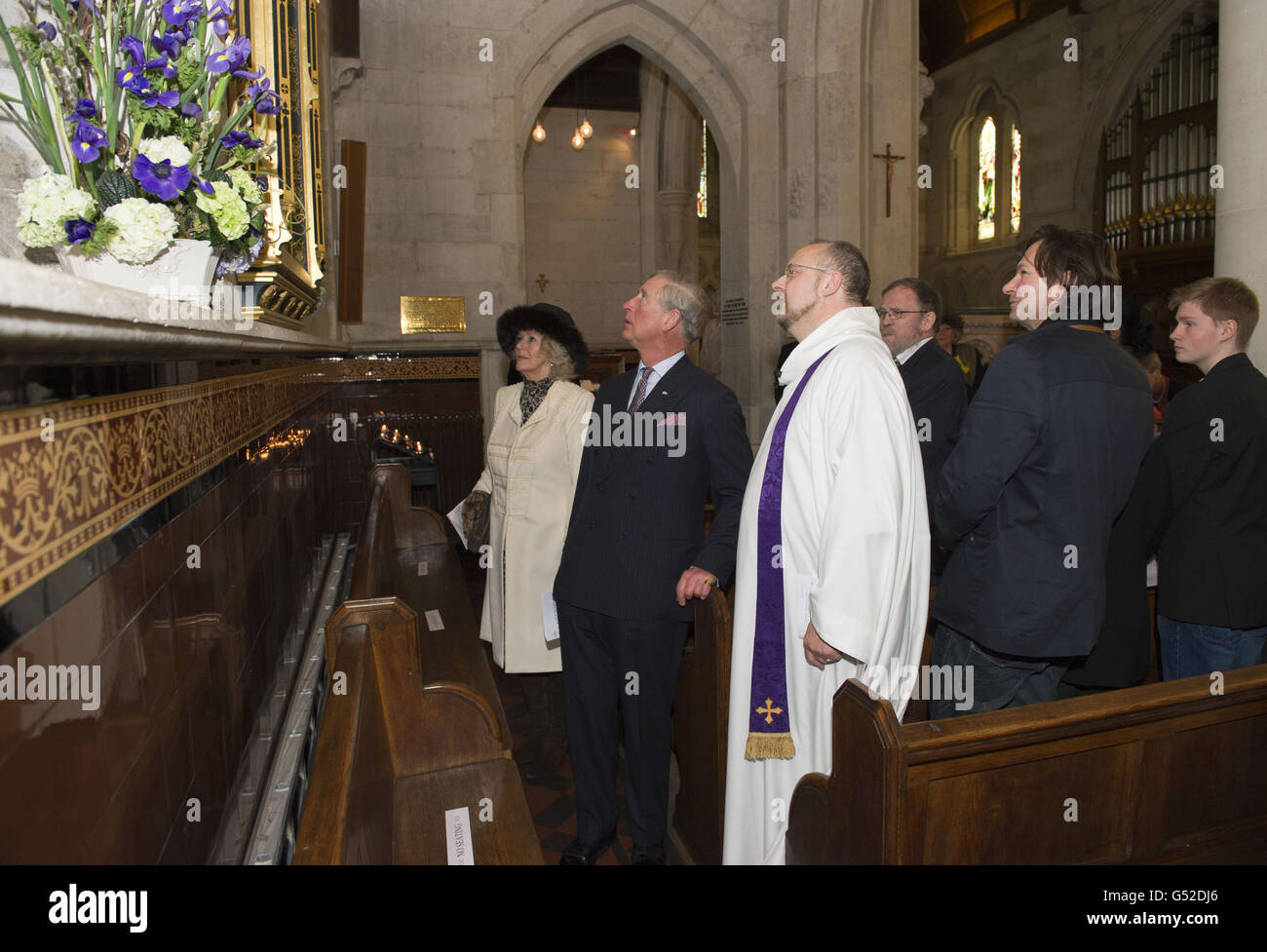 The Prince of Wales and the Duchess of Cornwall, view a floral display ...