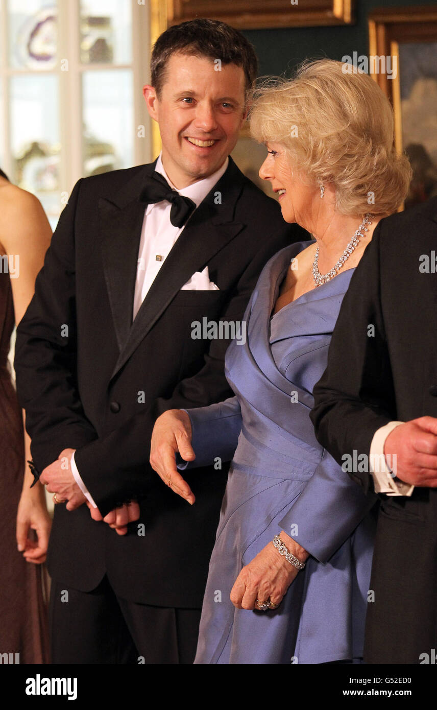 Crown Prince Frederik of Denmark talks to the Duchess of Cornwall in a ...