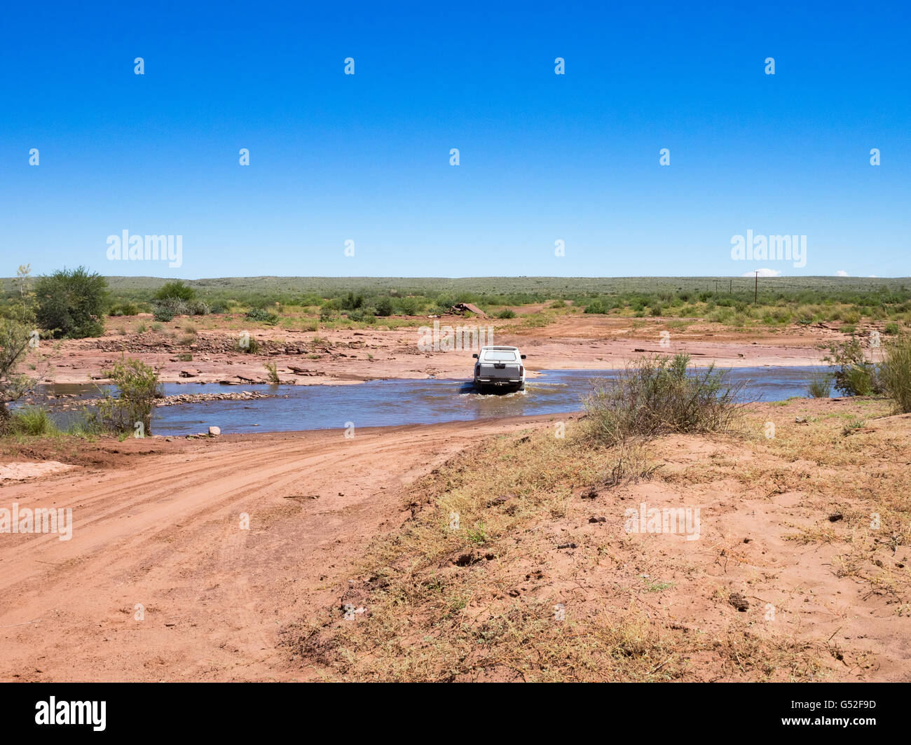 Namibia, Hardap, river crossing with a pickup, river crossing on the ...