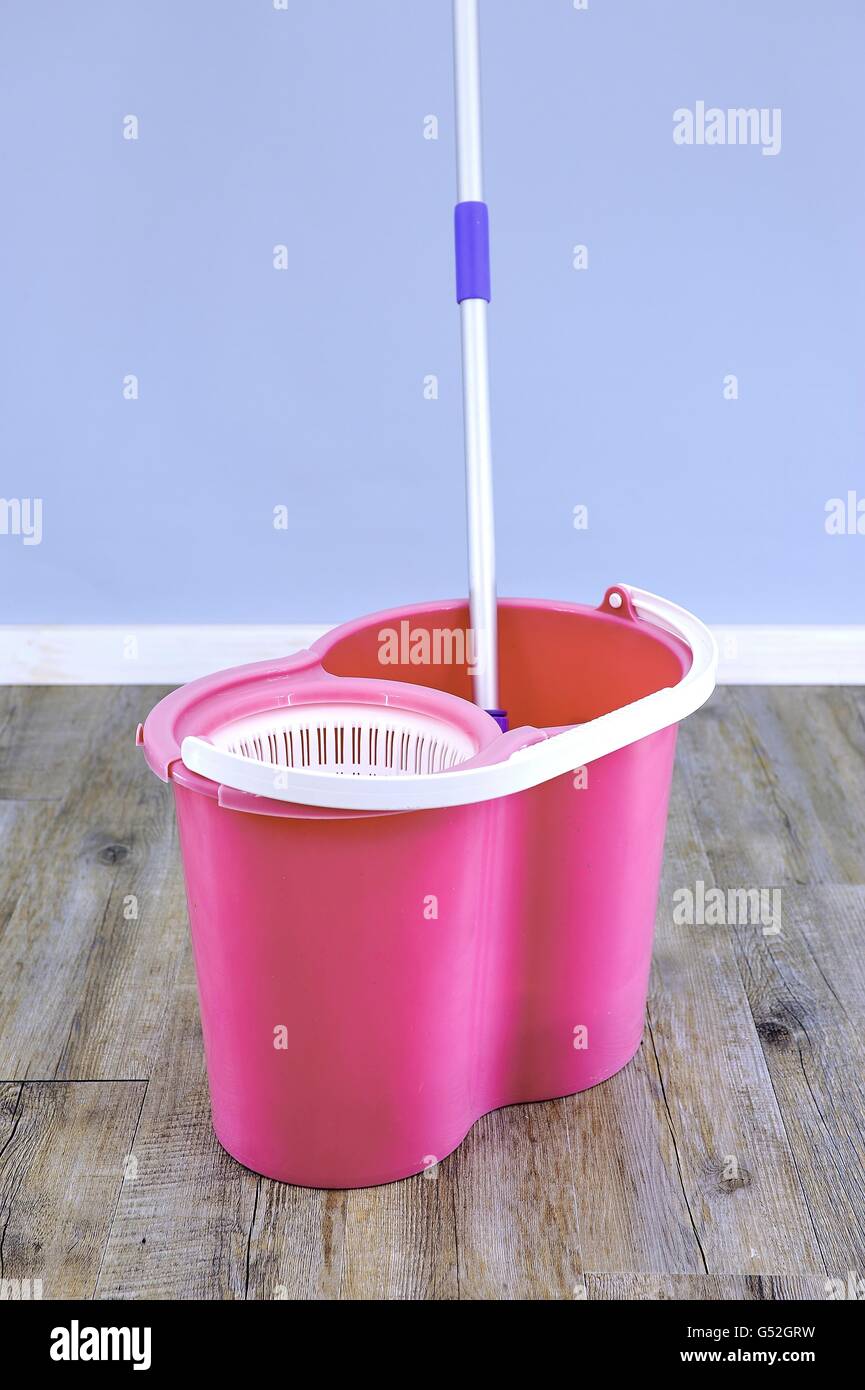 Photo of a broom and mop hi-res stock photography and images - Alamy