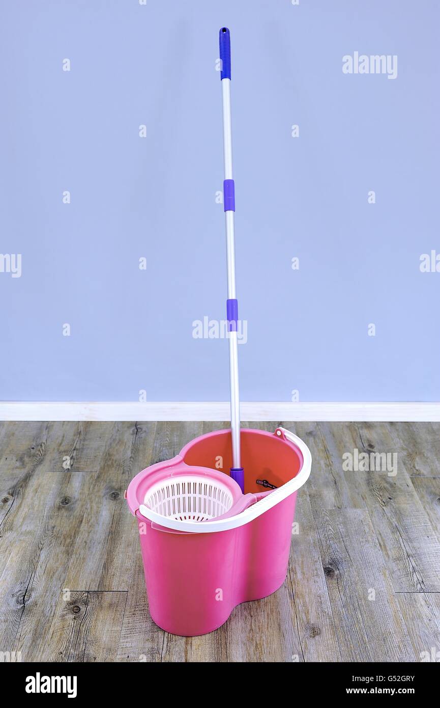 Photo of a broom and mop hi-res stock photography and images - Alamy