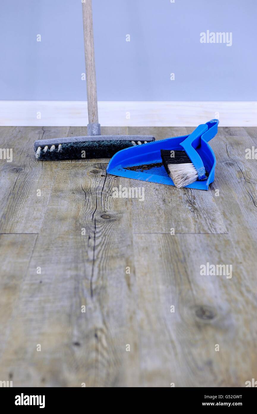 A studio photo of a broom cleaning up Stock Photo - Alamy