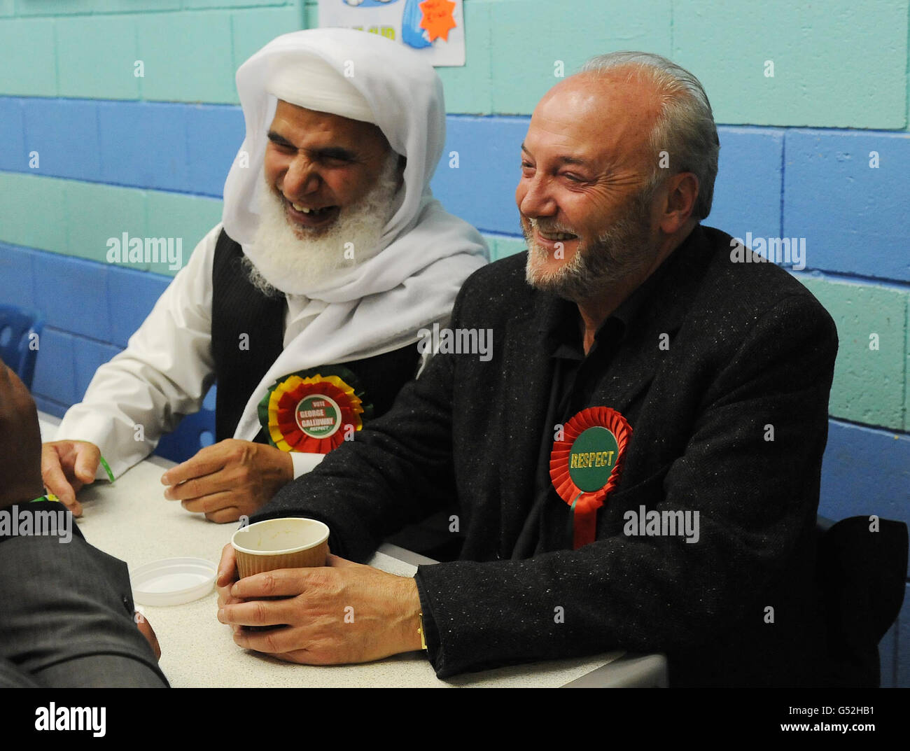 George Galloway of the Respect Party sits with his supporter Mohammed ...