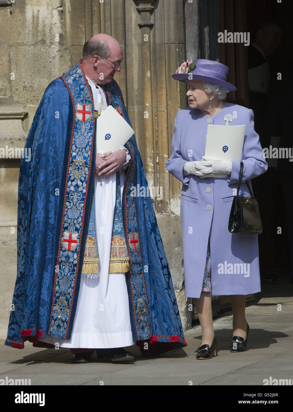Queen Elizabeth II and the Dean of Windsor David Conner leave a ...