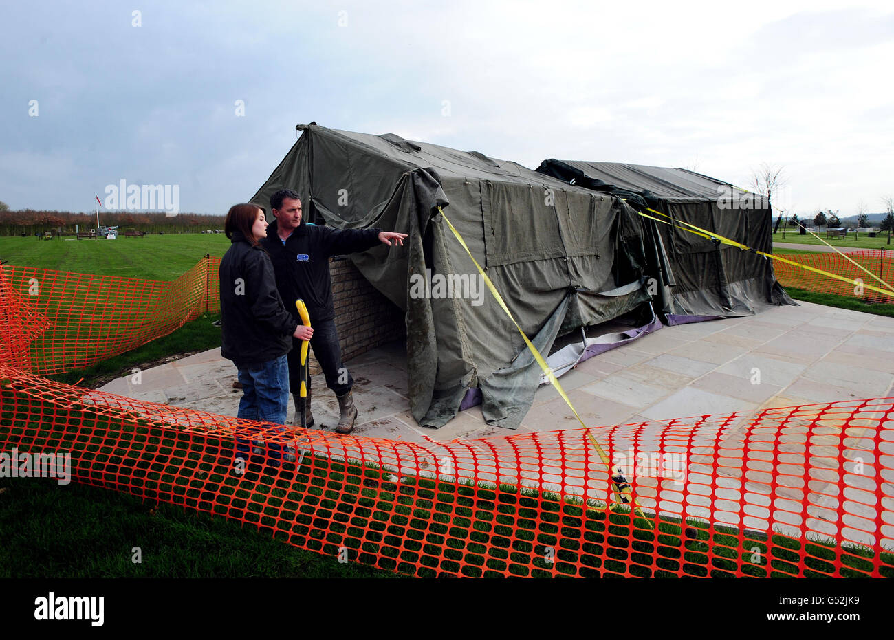 The Falklands Memorial is covered by a large tent as work continues ...