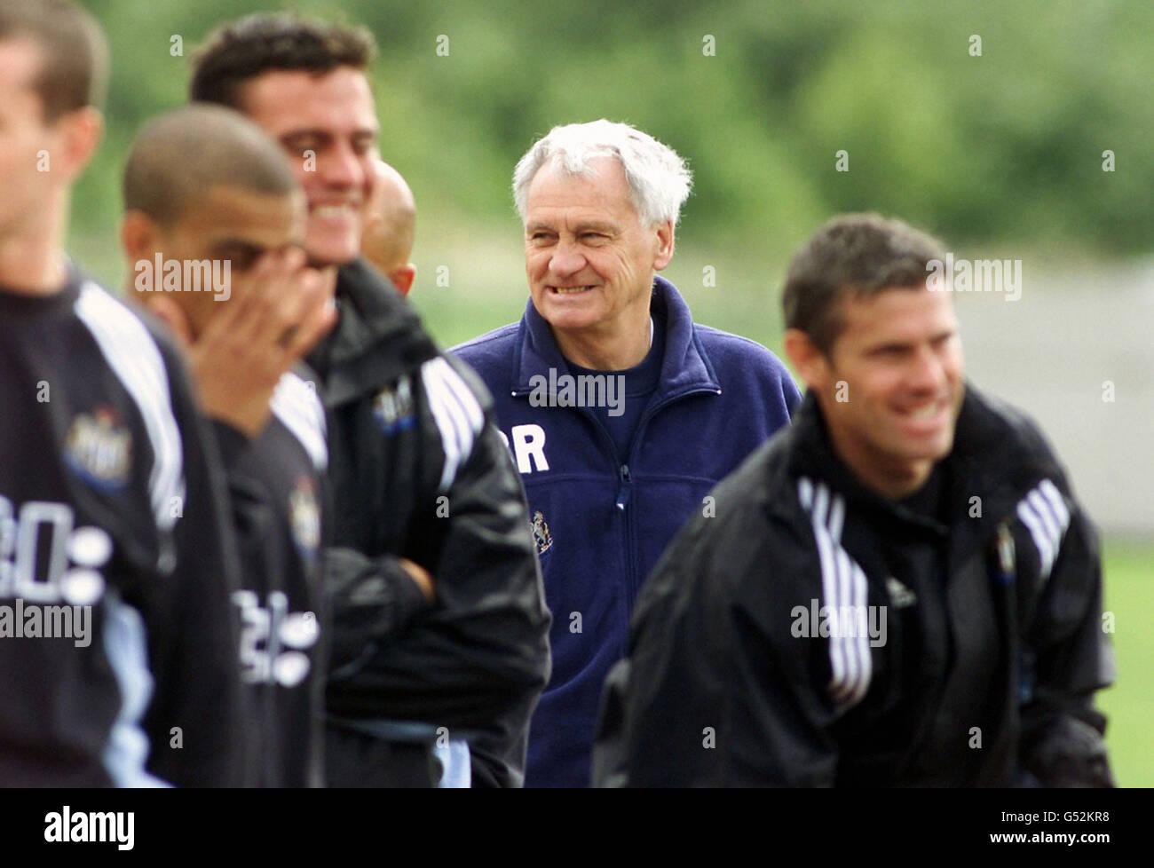 Newcastle United manager Bobby Robson (background) at the club's first ...