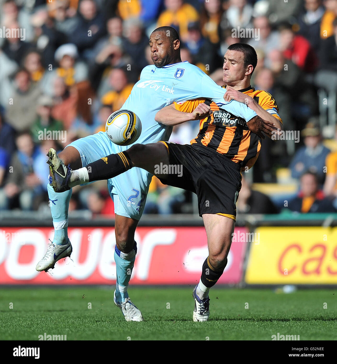 Coventry City's Clive Platt and Hull City's Jack Hobbs (right) battle ...