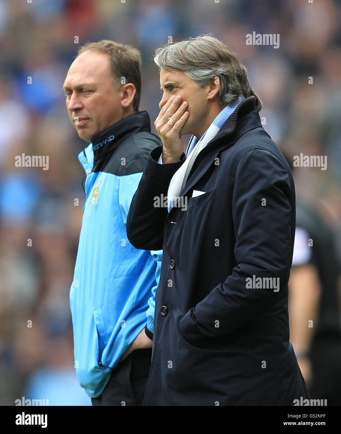 Manchester City's manager Roberto Mancini and First Team Coach David ...